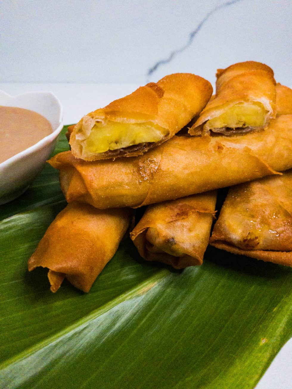 Banana Lumpia with Coconut Caramel Sauce - She's Almost Always Hungry